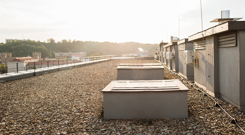 What Are Gravel and Stone Ballasts For on Commercial Roofs?